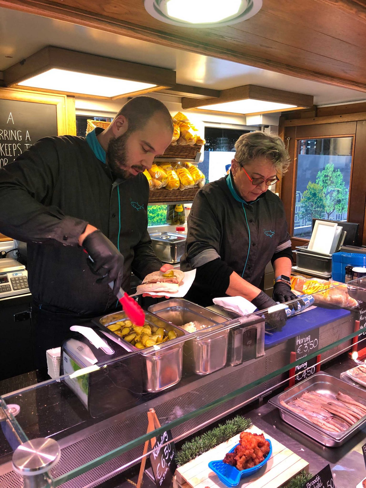 Where to Eat Dutch Haring (Herring) in Amsterdam? Frens Haringhandel ...